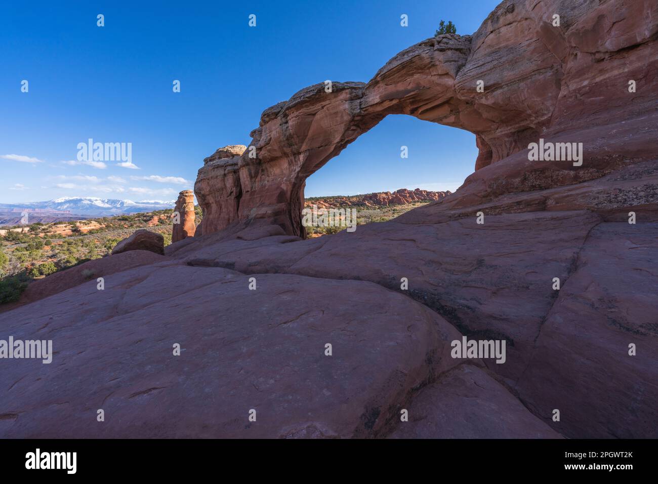 hiking the broken arch trail in arches national park in utah, usa Stock ...