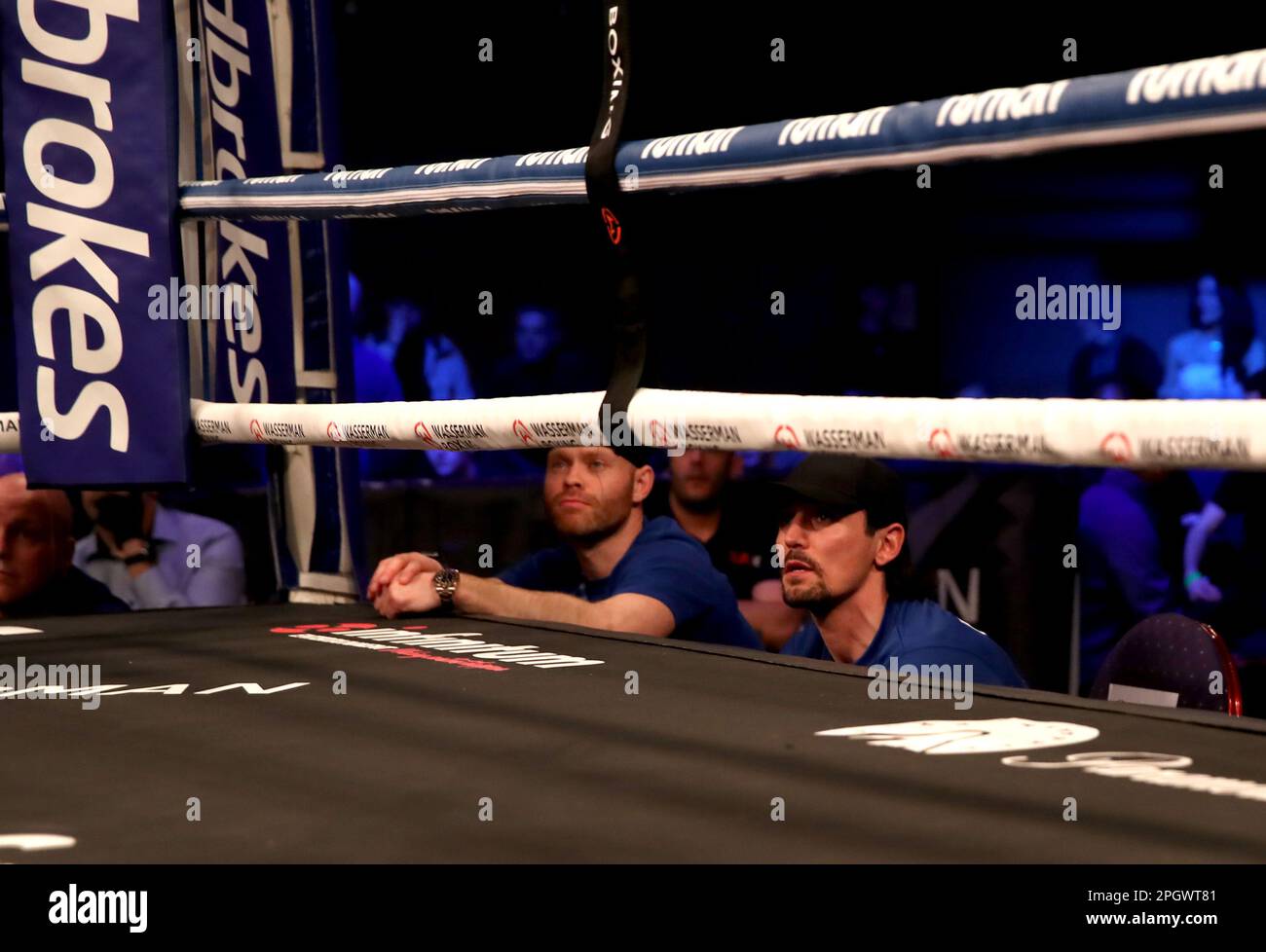 Bobby Faulkner's boxing coach Anthony Crolla (right) watches his ...