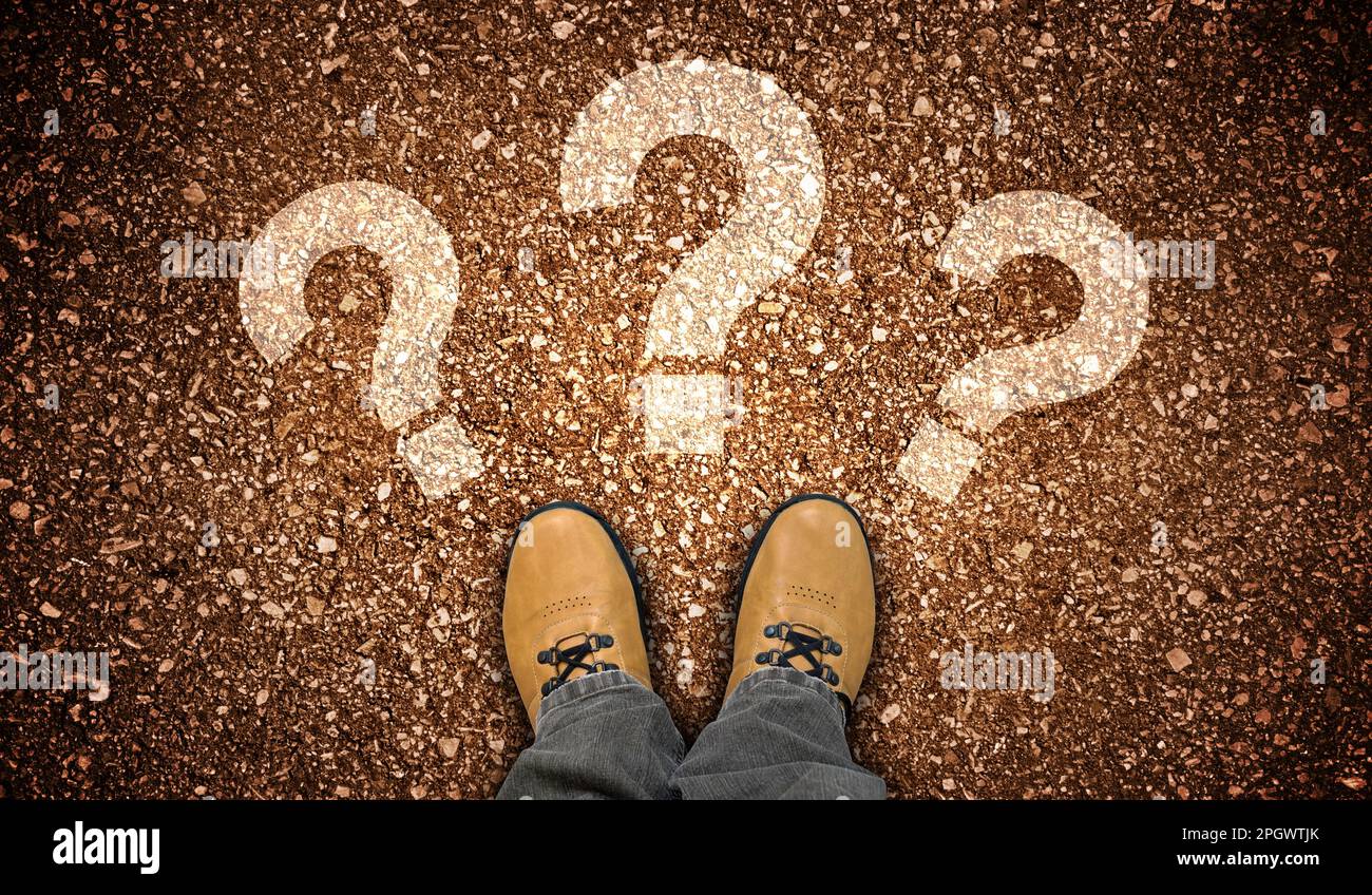 Yellow leather shoes and three question marks - problem concept Stock ...