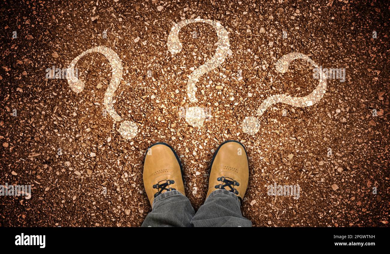 Yellow leather shoes and three question marks - problem concept Stock ...