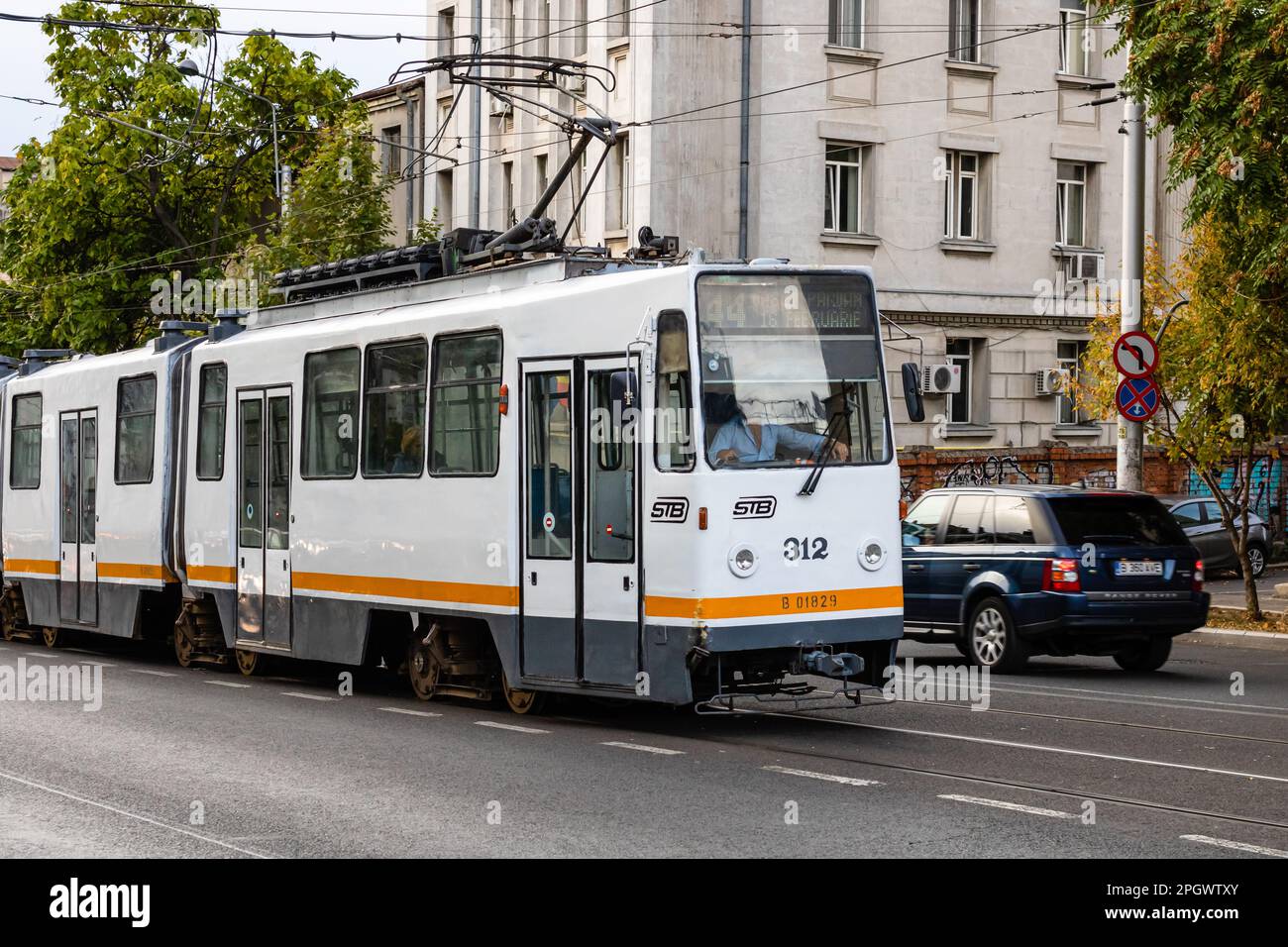 Tram in traffic. Public transport Bucharest, Romania, 2022 Stock Photo ...
