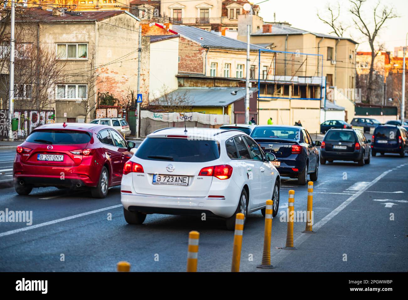Car traffic at rush hour in downtown area of the city. Car pollution ...