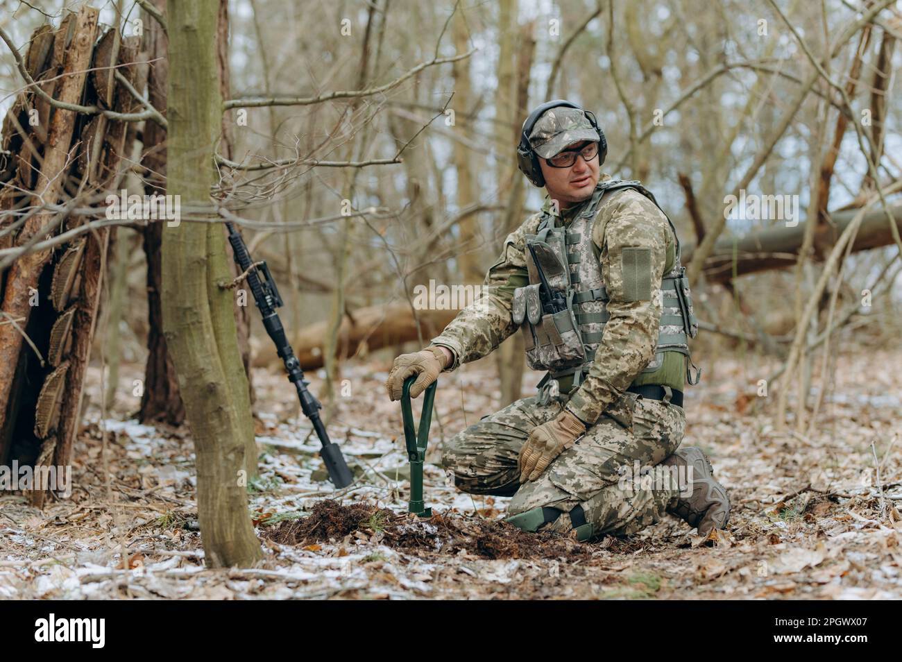 Preparation for the attack. Digging a trench Stock Photo - Alamy
