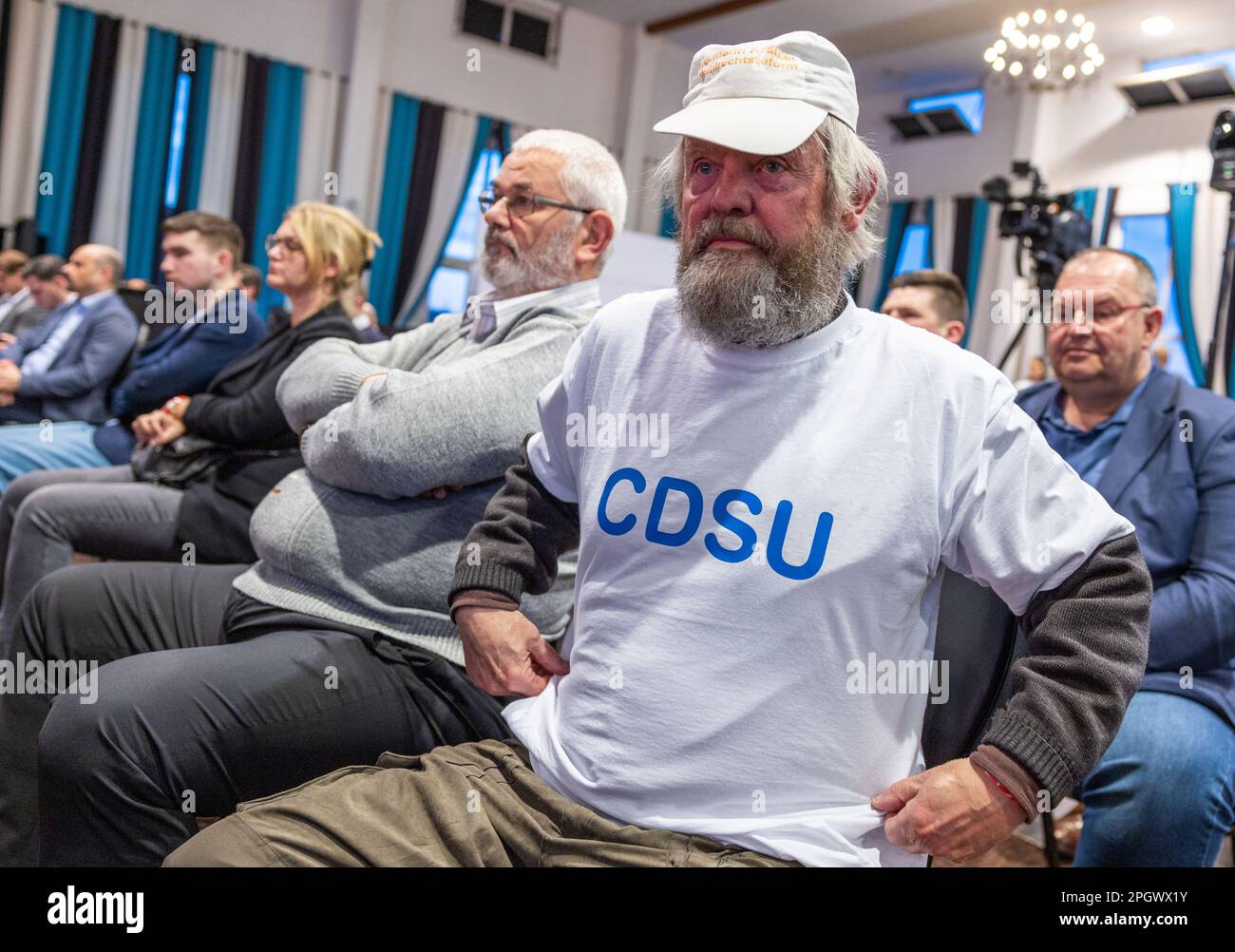 Linstow, Germany. 24th Mar, 2023. A participant wears a T-shirt with ...