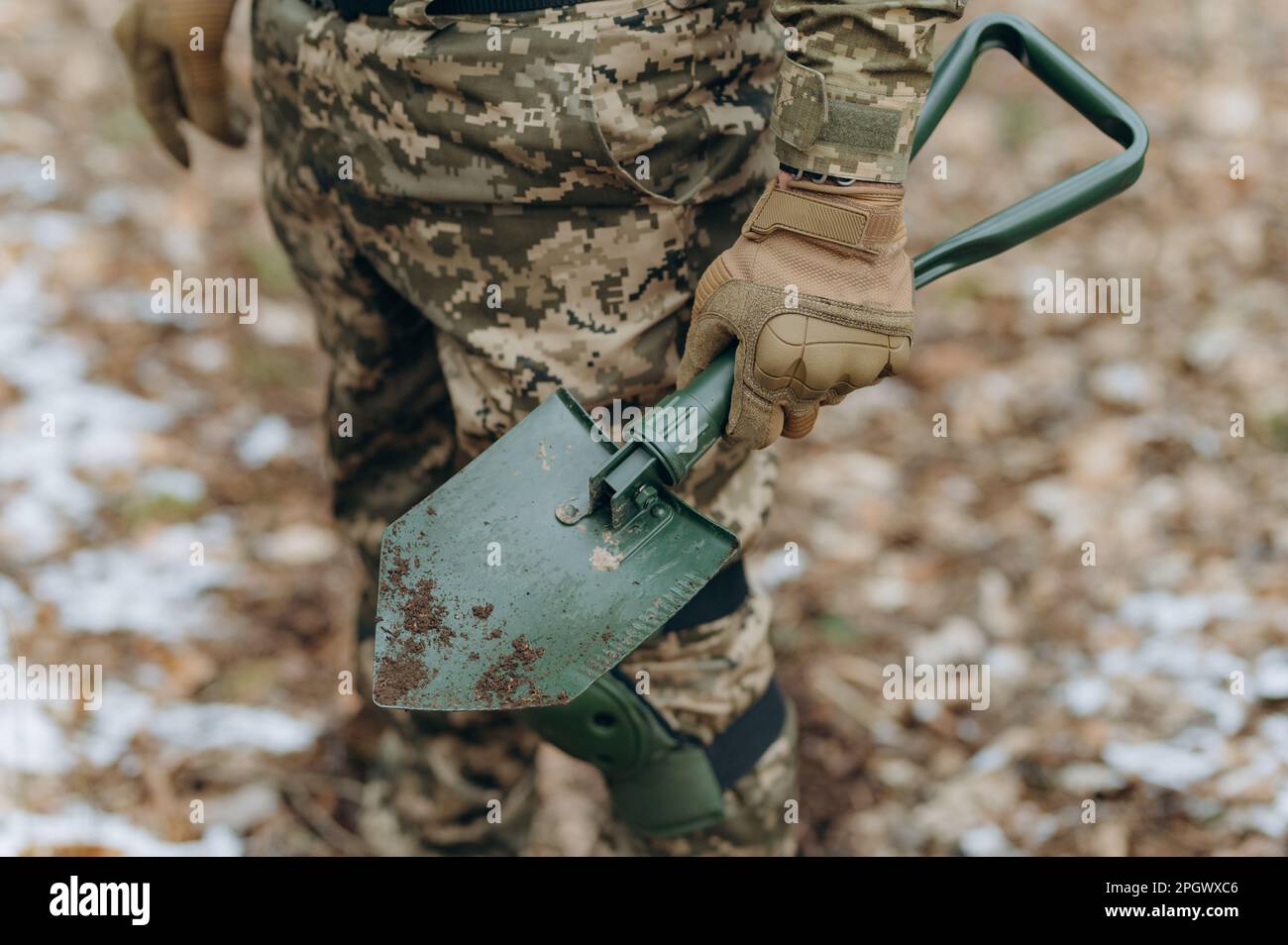 Preparation for the attack. Digging a trench Stock Photo - Alamy