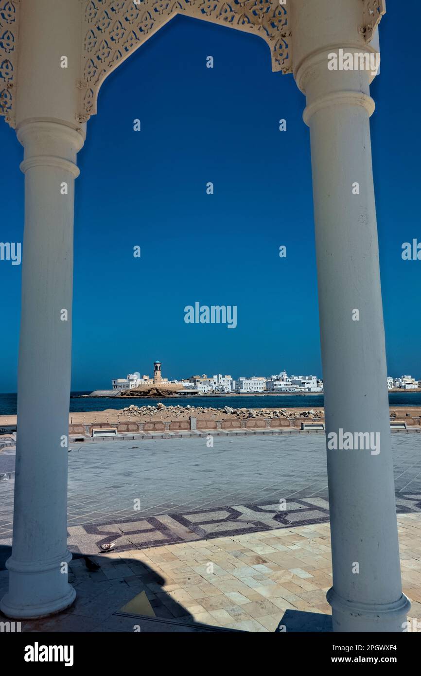 View of whitewashed houses and Al Ayjah lighthouse in Sur, Ash ...