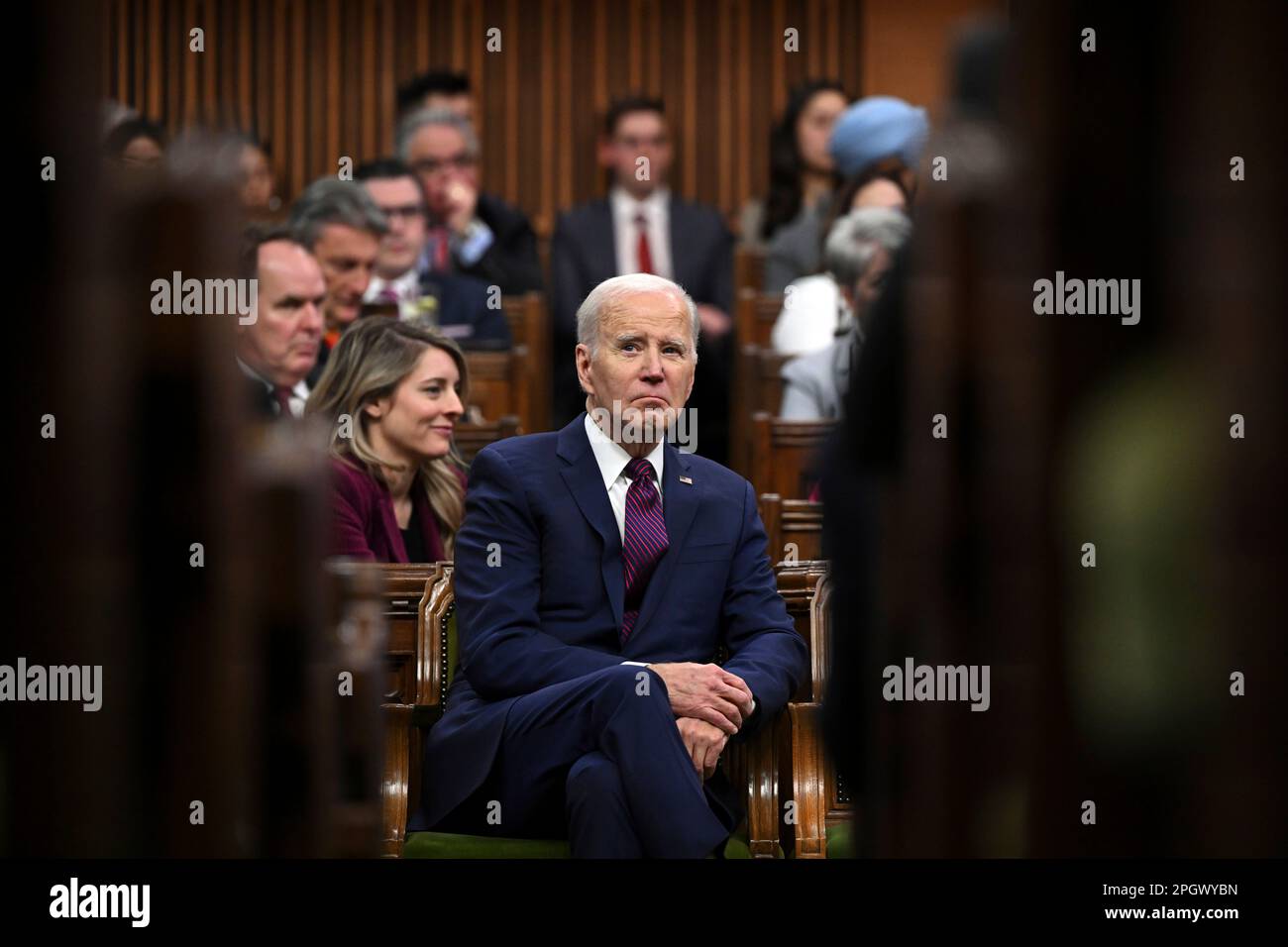 President Joe Biden waits to speak at the Canadian Parliament in Ottawa ...