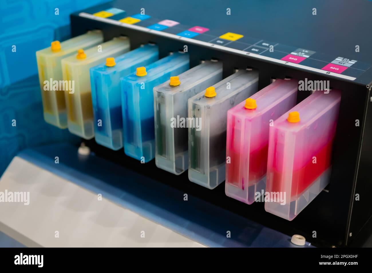 Row of inkjet printer CMYK cartridges - close up Stock Photo - Alamy