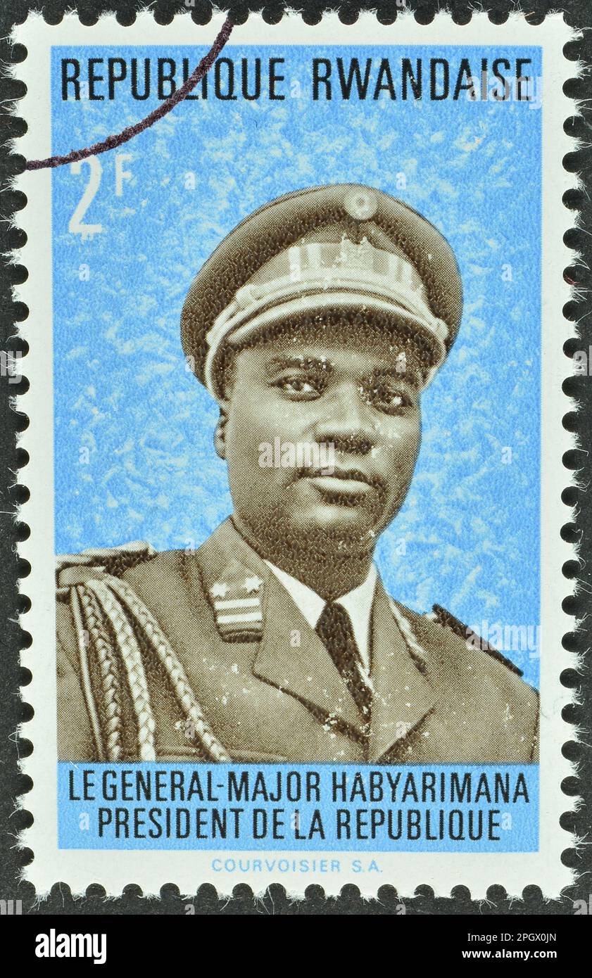 Cancelled postage stamp printed by Rwanda, that shows President Juvénal ...