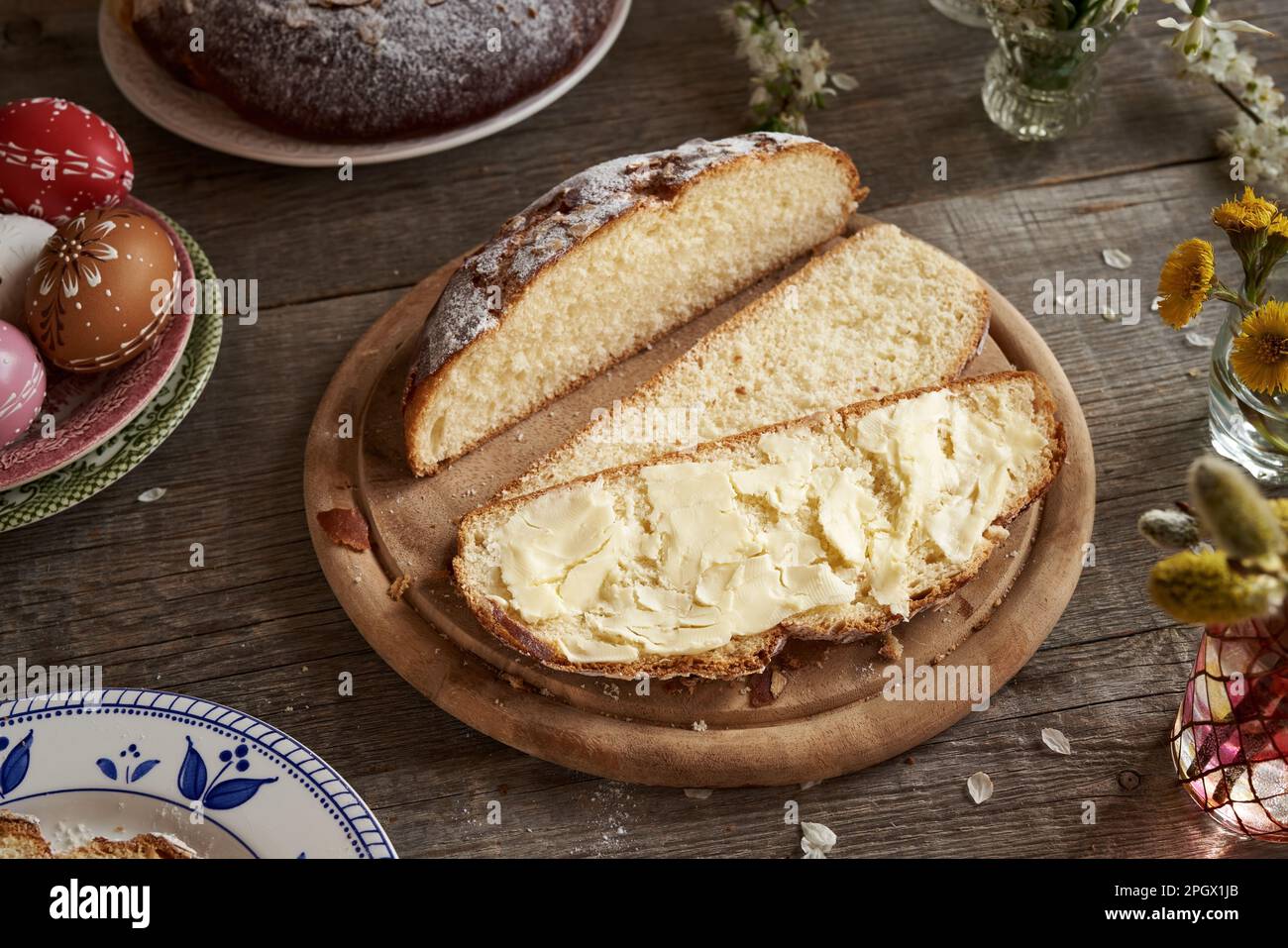 Siced mazanec with butter - traditional Czech sweet Easter pastry, with ...