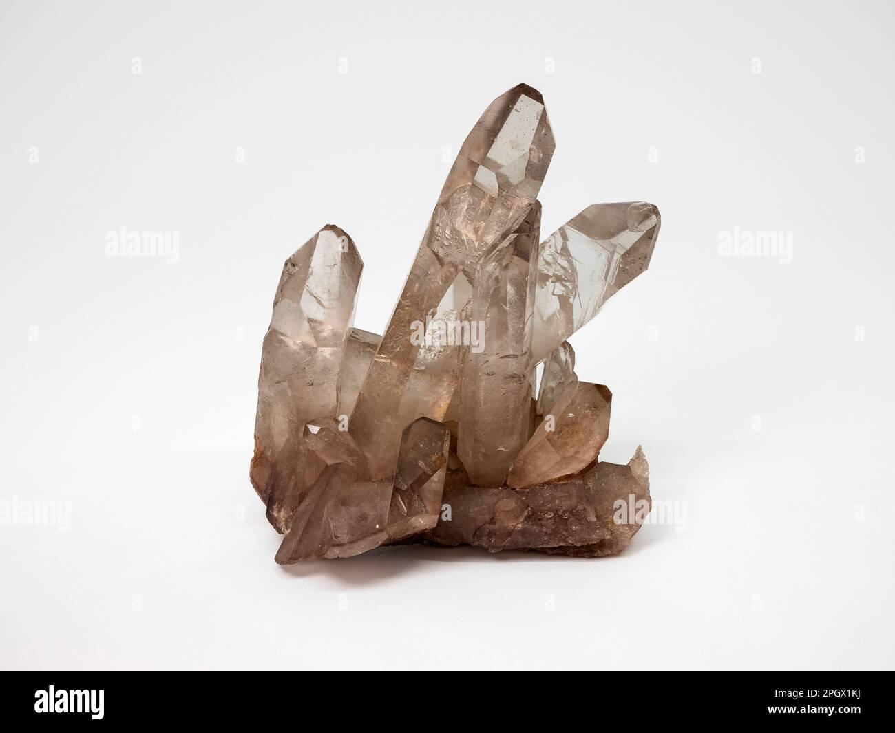 quartz crystal cluster isolated with white background Stock Photo - Alamy