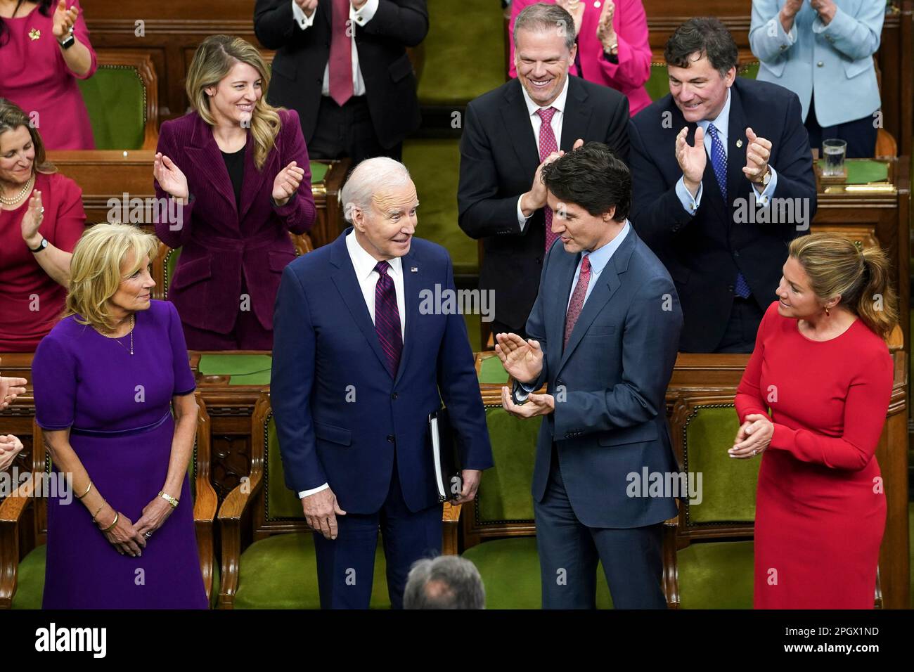 President Joe Biden stands next to first lady Jill Biden, Canadian ...