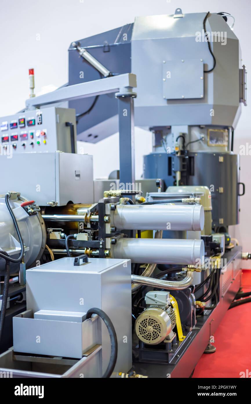 Back side of plastic recycling machine at exhibition, factory Stock ...