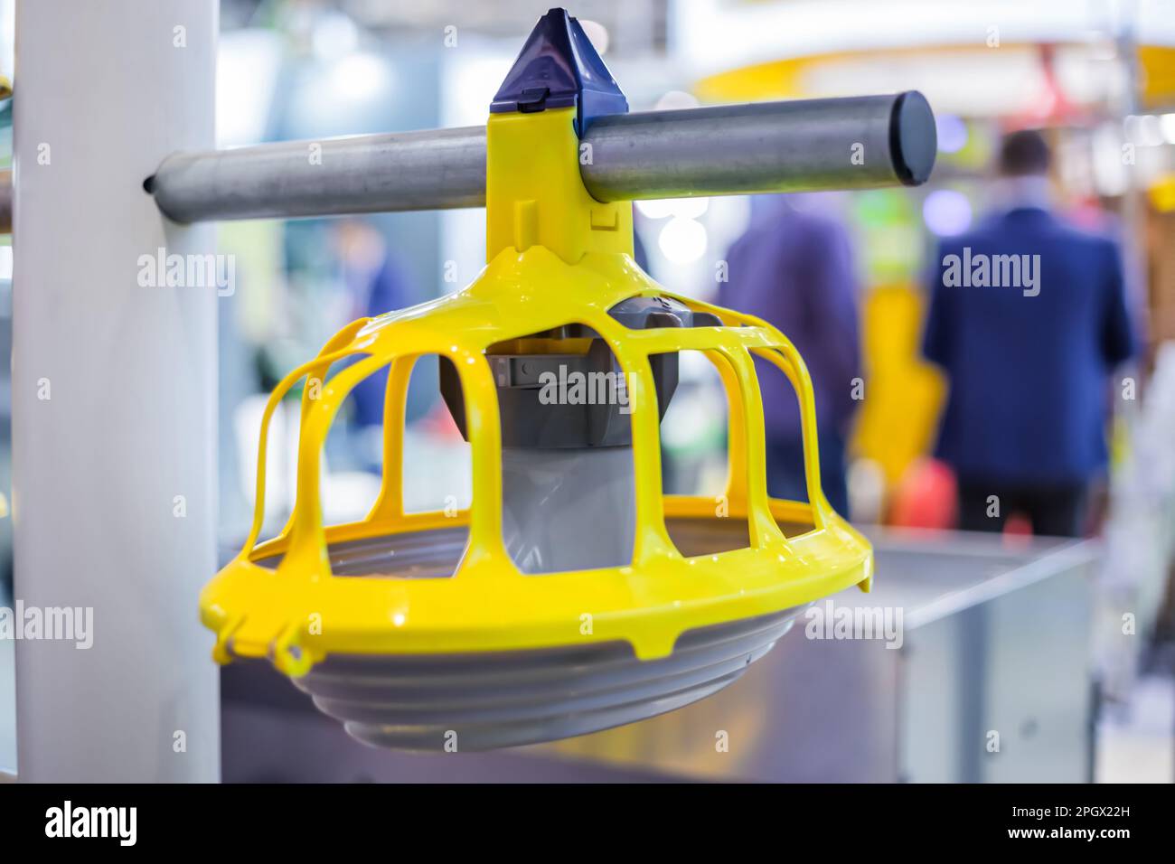 Plastic automatic yellow chicken feeder for poultry farm at exhibition ...