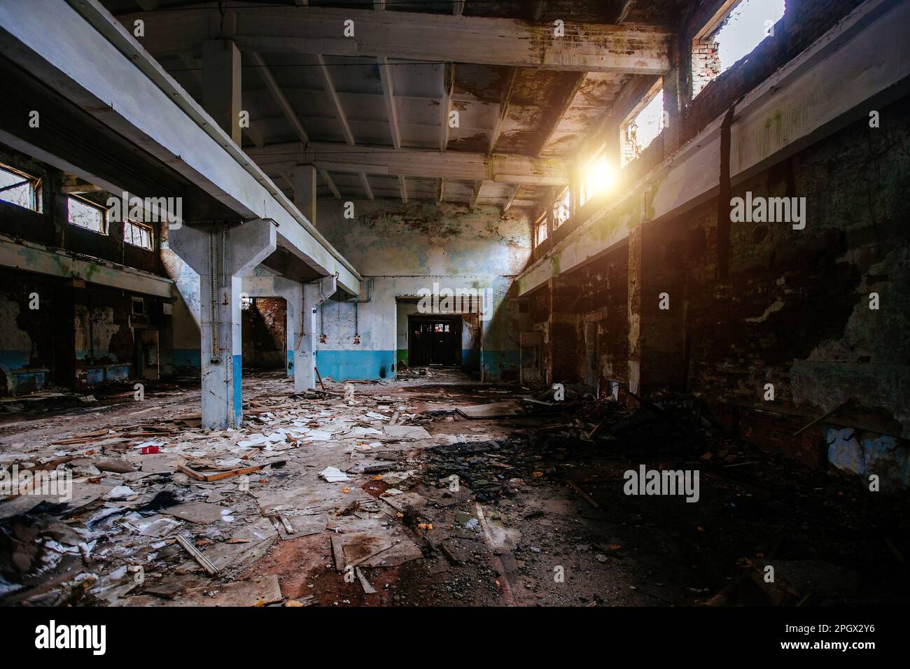 Old broken empty abandoned industrial building interior Stock Photo - Alamy