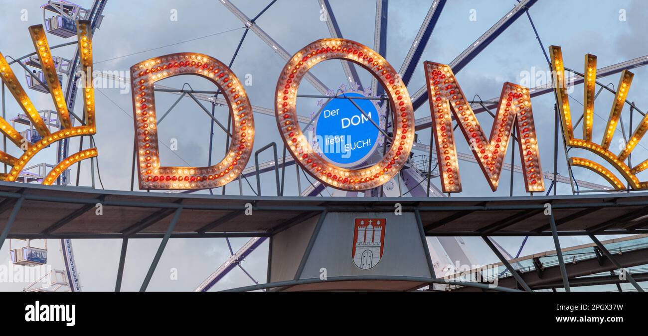 Hamburg, Germany. 24th Mar, 2023. The "DOM" lettering lights up on the ...