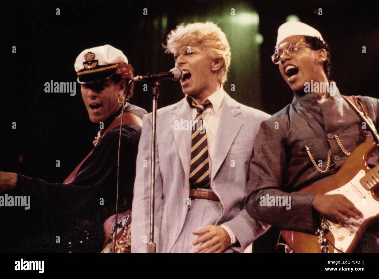 David Bowie flanked by guitarists Carmine Rojas and Carlos Alomar ...