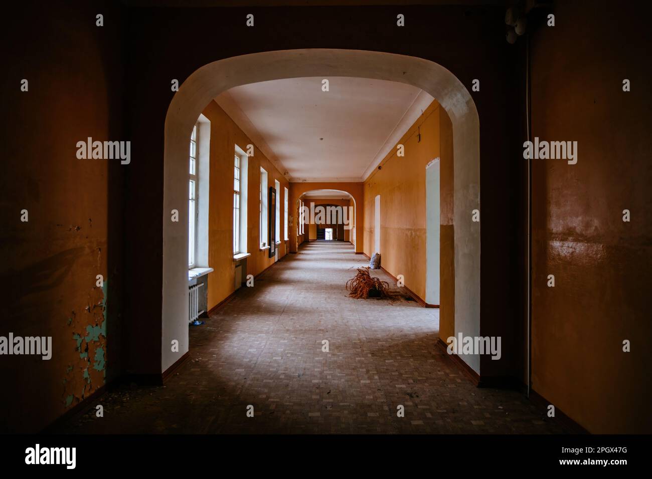 Dark dirty corridor of old abandoned school Stock Photo - Alamy