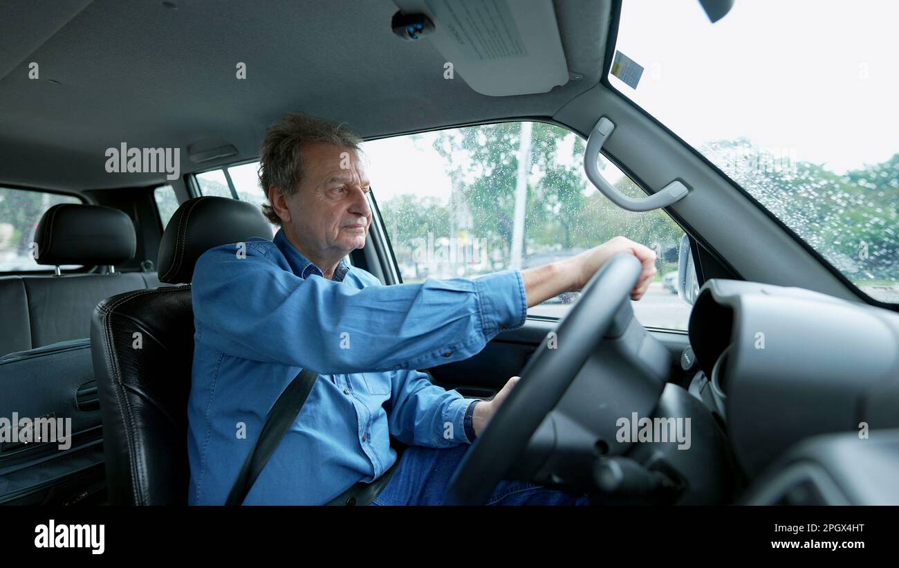 Senior driving inside moving vehicle hi-res stock photography and ...