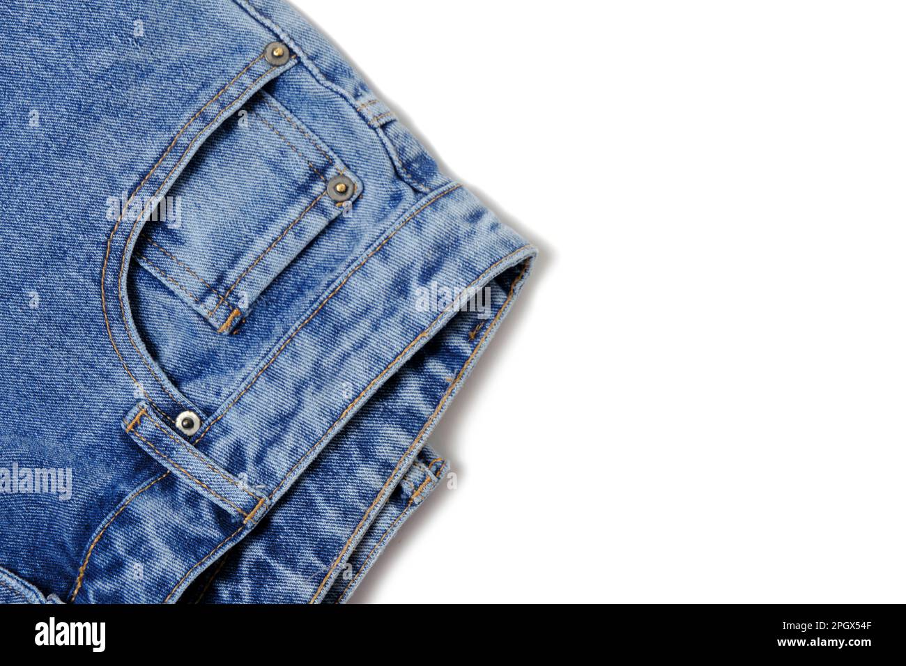 Folded denim pants white background Stock Photo - Alamy