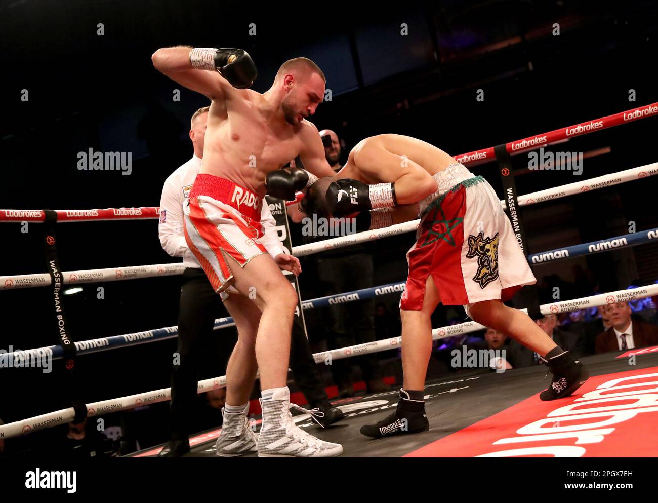 Denis Radovan (left) and Fouad El Massoudi in action during their ...