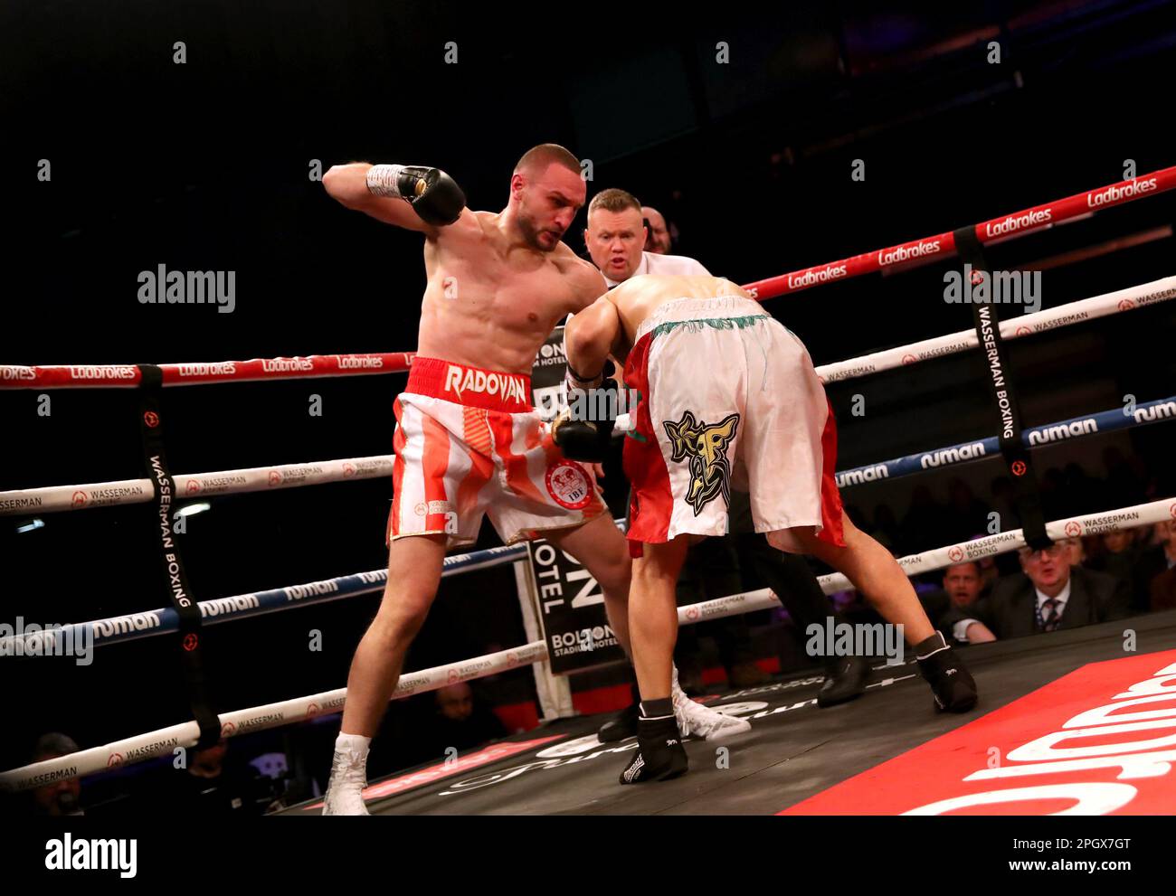 Denis Radovan (left) and Fouad El Massoudi in action during their ...