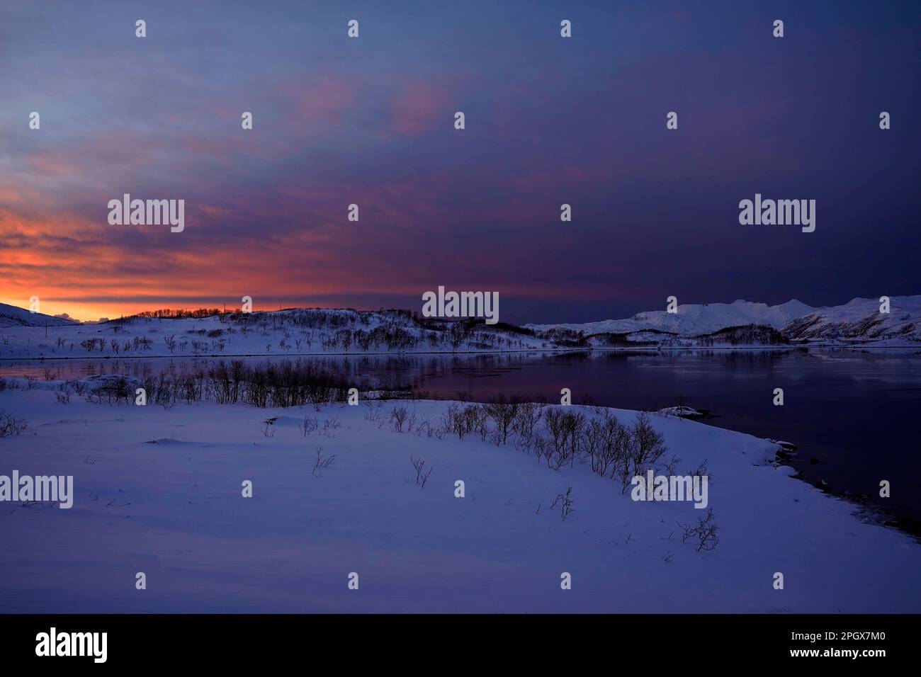 snowy landscape fjord tromso norway sunset Stock Photo - Alamy