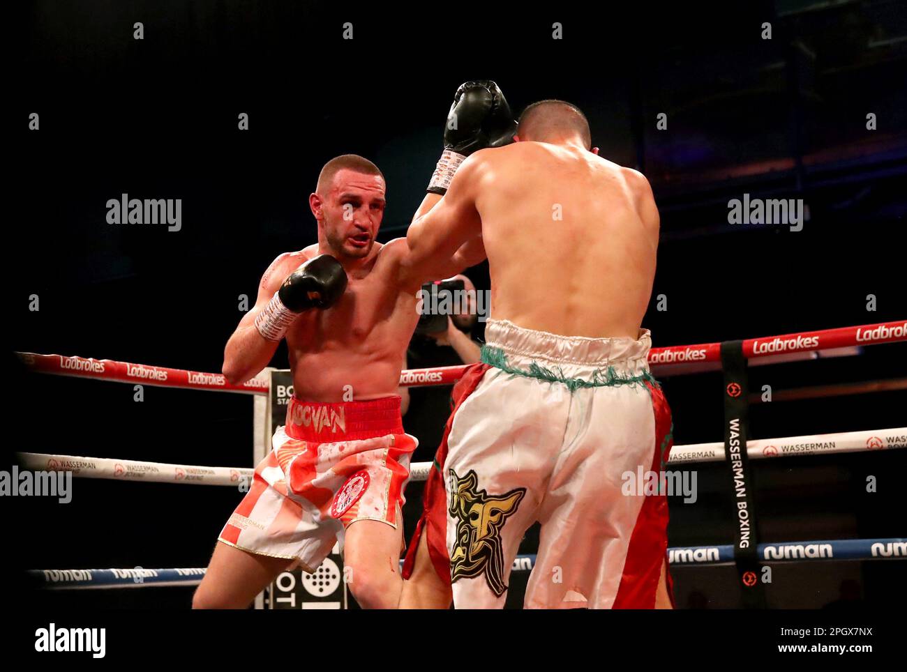 Denis Radovan (left) and Fouad El Massoudi in action during their ...