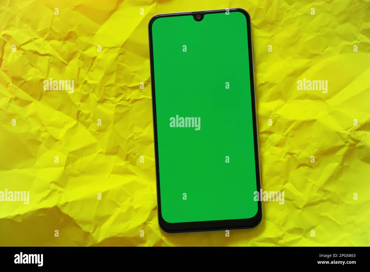 touchscreen phone with a green screen on a light background Stock Photo ...