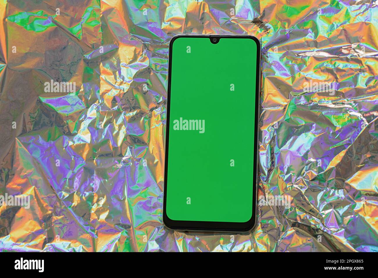 touchscreen phone with a green screen on a light background Stock Photo ...