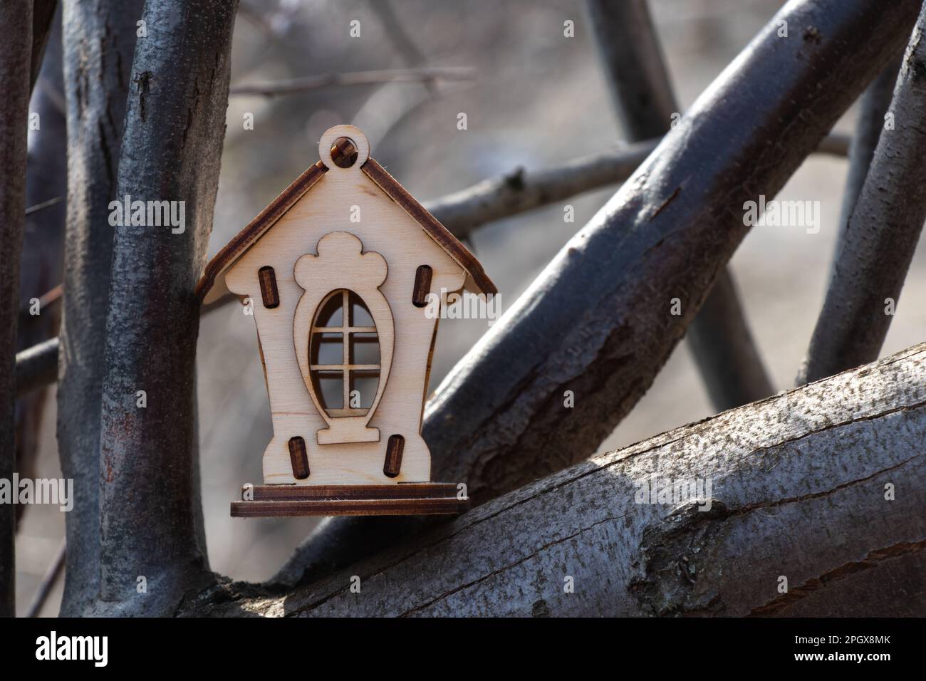 wooden little house stands on tree branches Stock Photo - Alamy
