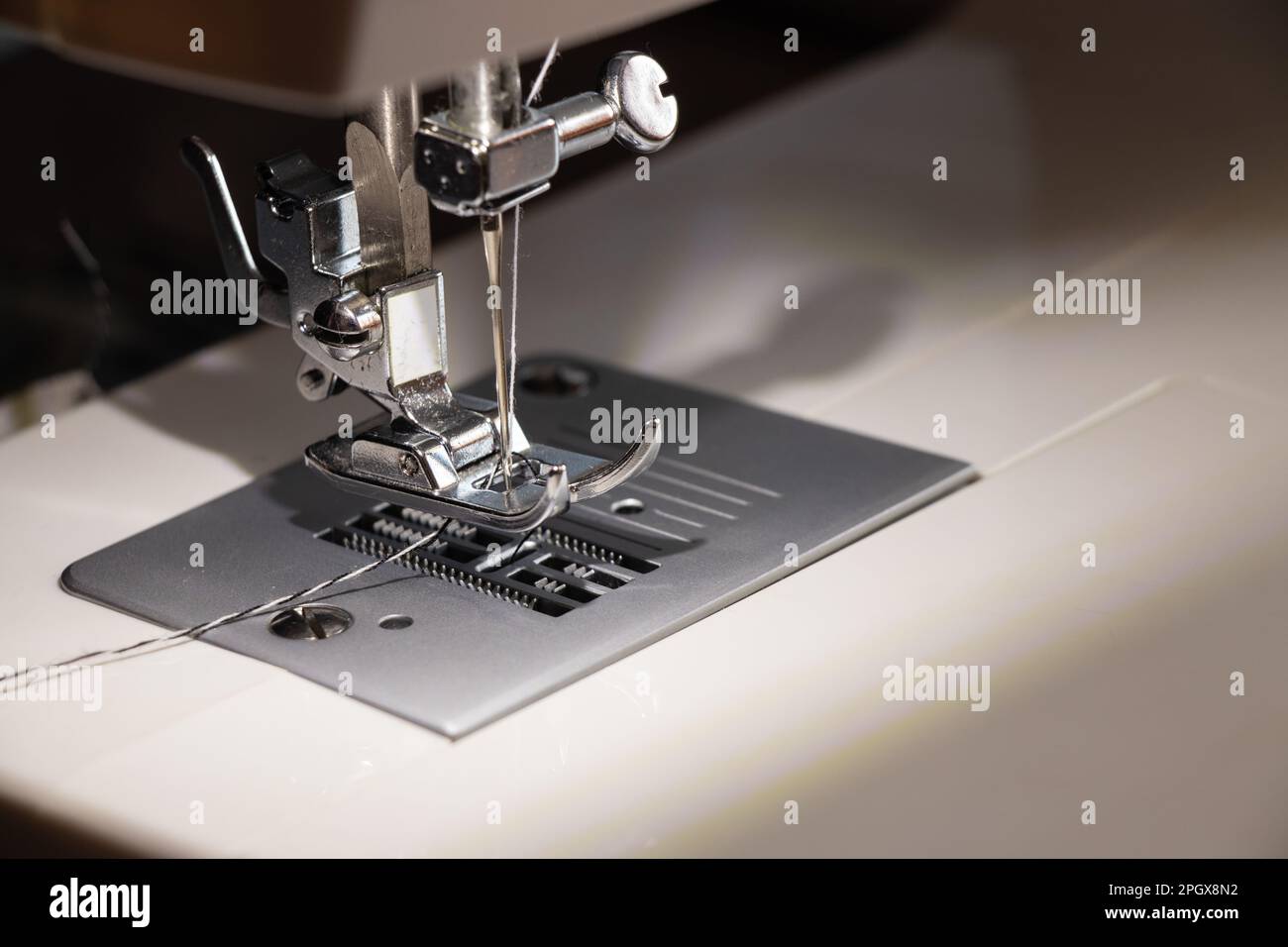 Industrial sewing machine work close hi-res stock photography and ...