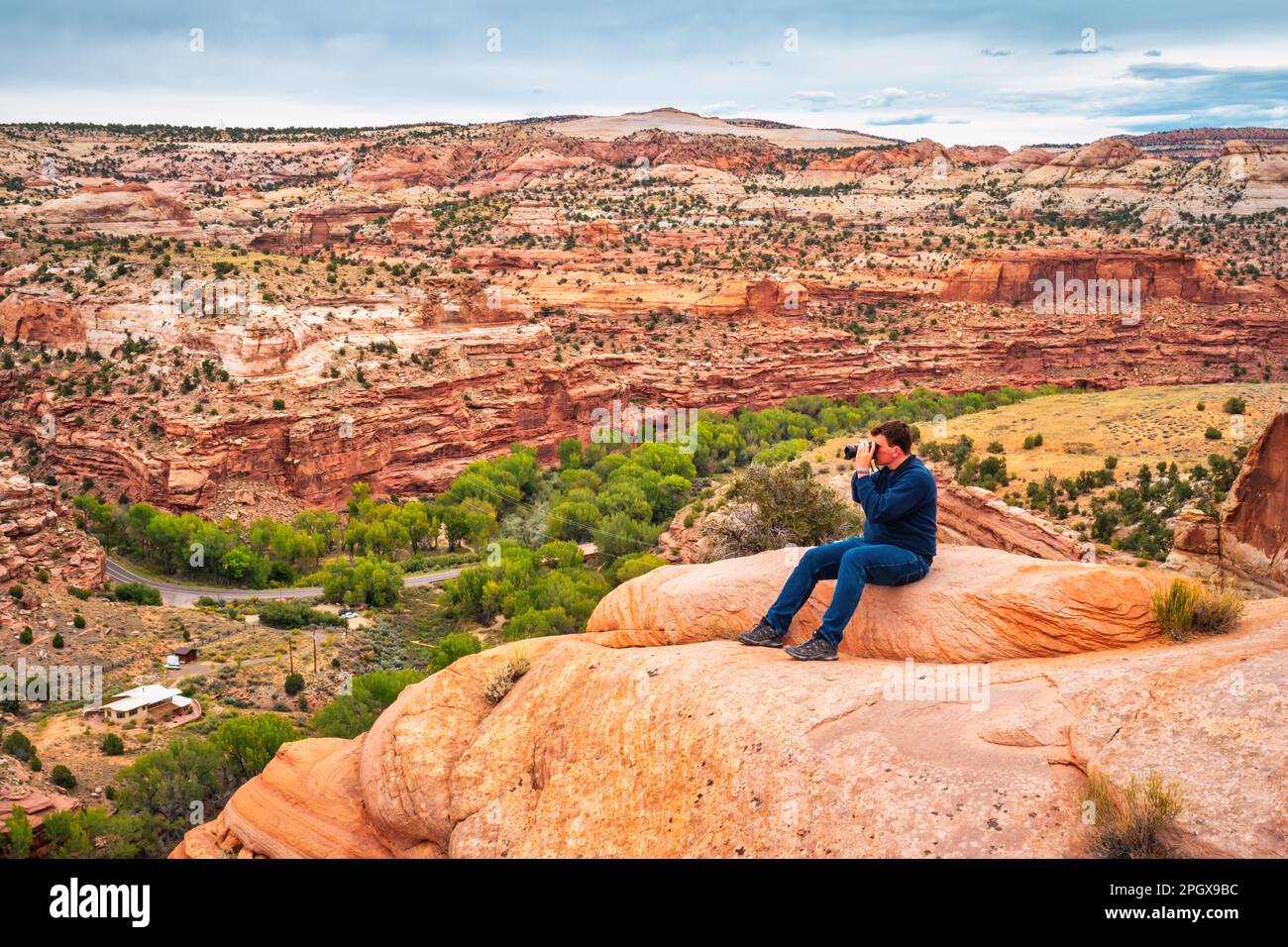 Photographer takes pictures at the Escalante River canyon in Grand Staircase-Escalante National ...