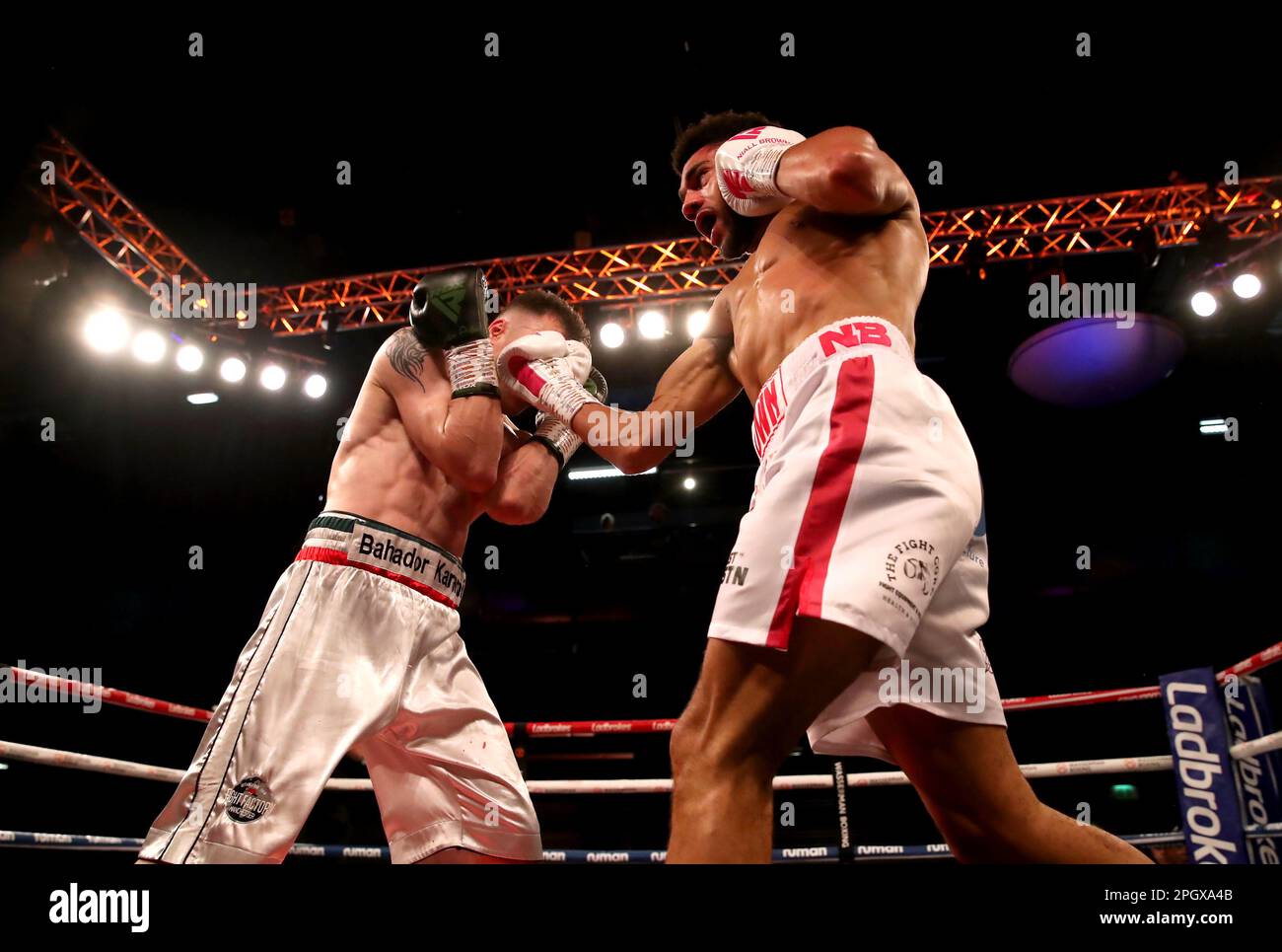 Niall Brown (right) and Bahadur Karami in action during their ...