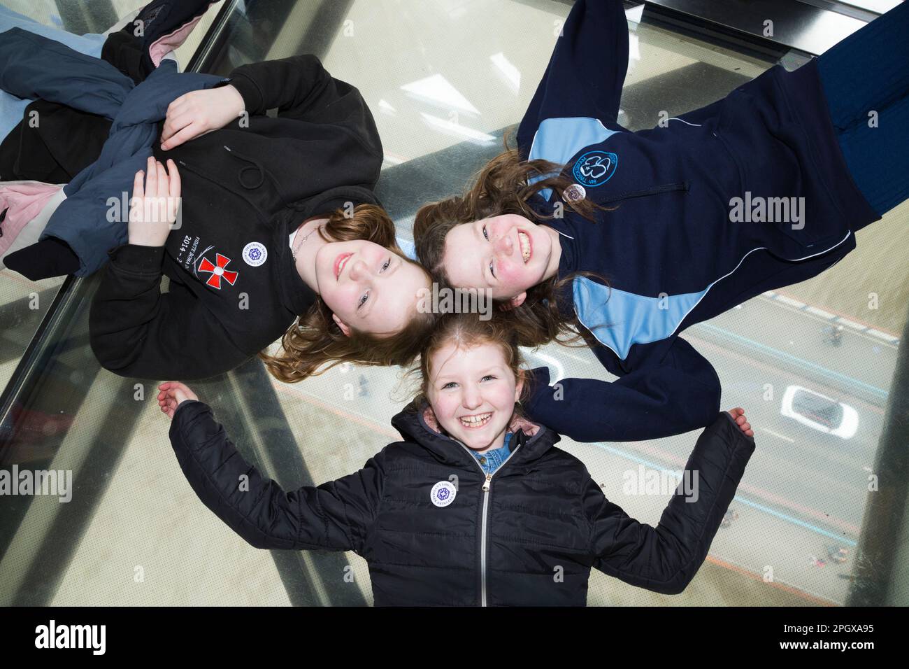 Tourist children child kid visitors to Tower Bridge pose to camera for ...