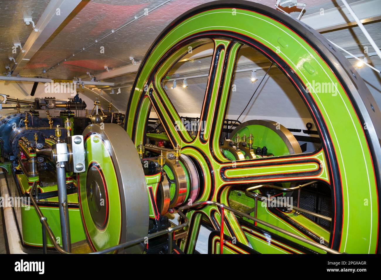 Large fly wheel in the Engine Rooms of Tower Bridge, which spans the ...