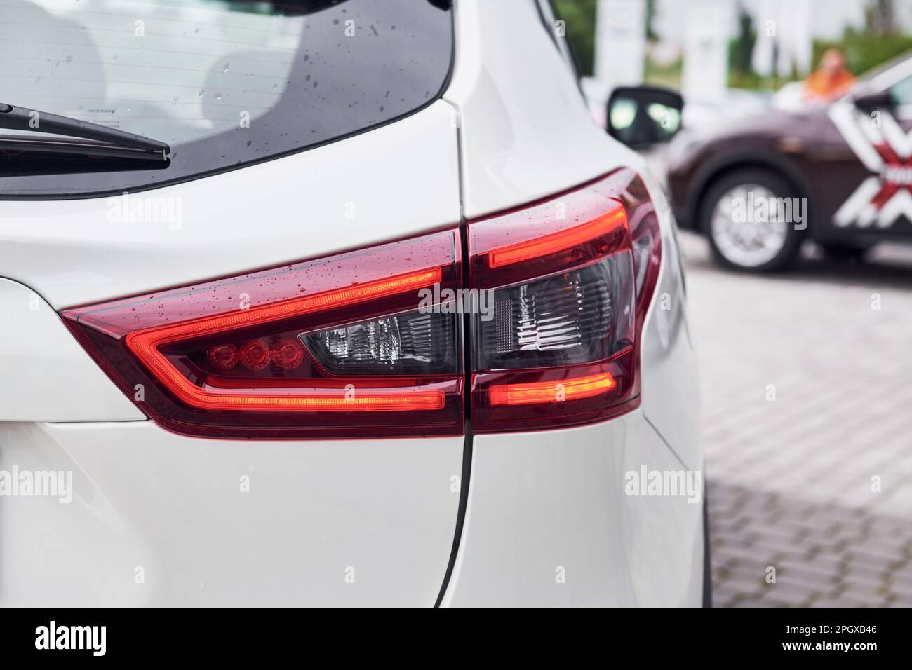 Rear particle view of modern white automobile. Close up view of ...