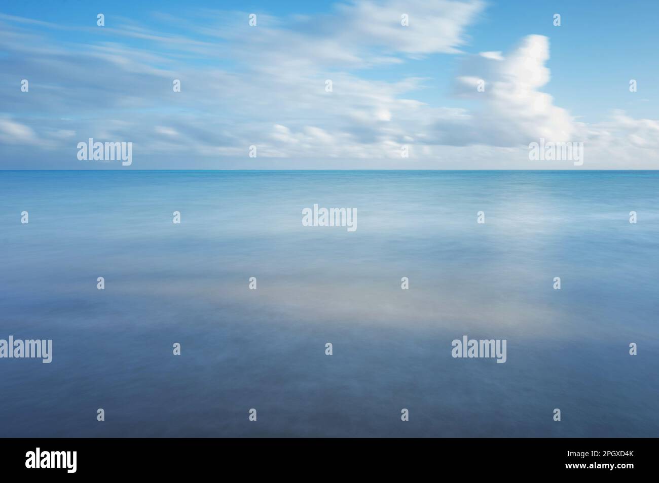 Blue smooth sea water with sky background. Soft clean tropical seascape ...