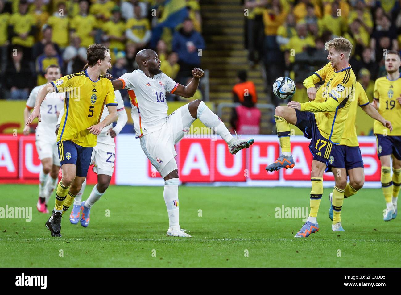Solna, Sweden. 24th Mar, 2023. Sweden's Hjalmar Ekdal, Belgium's Romelu ...