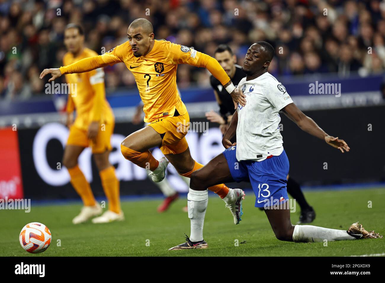 SAINT-DENIS - (lr) Donyell Malen of Holland, Ibrahima Konate of France ...