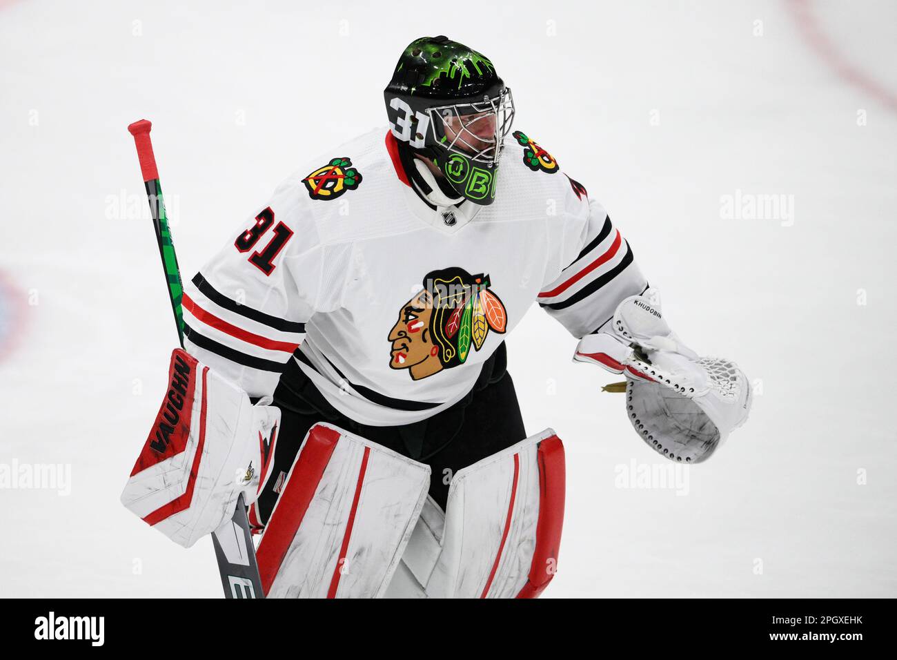 Chicago Blackhawks goaltender Anton Khudobin (31) warms up before an ...