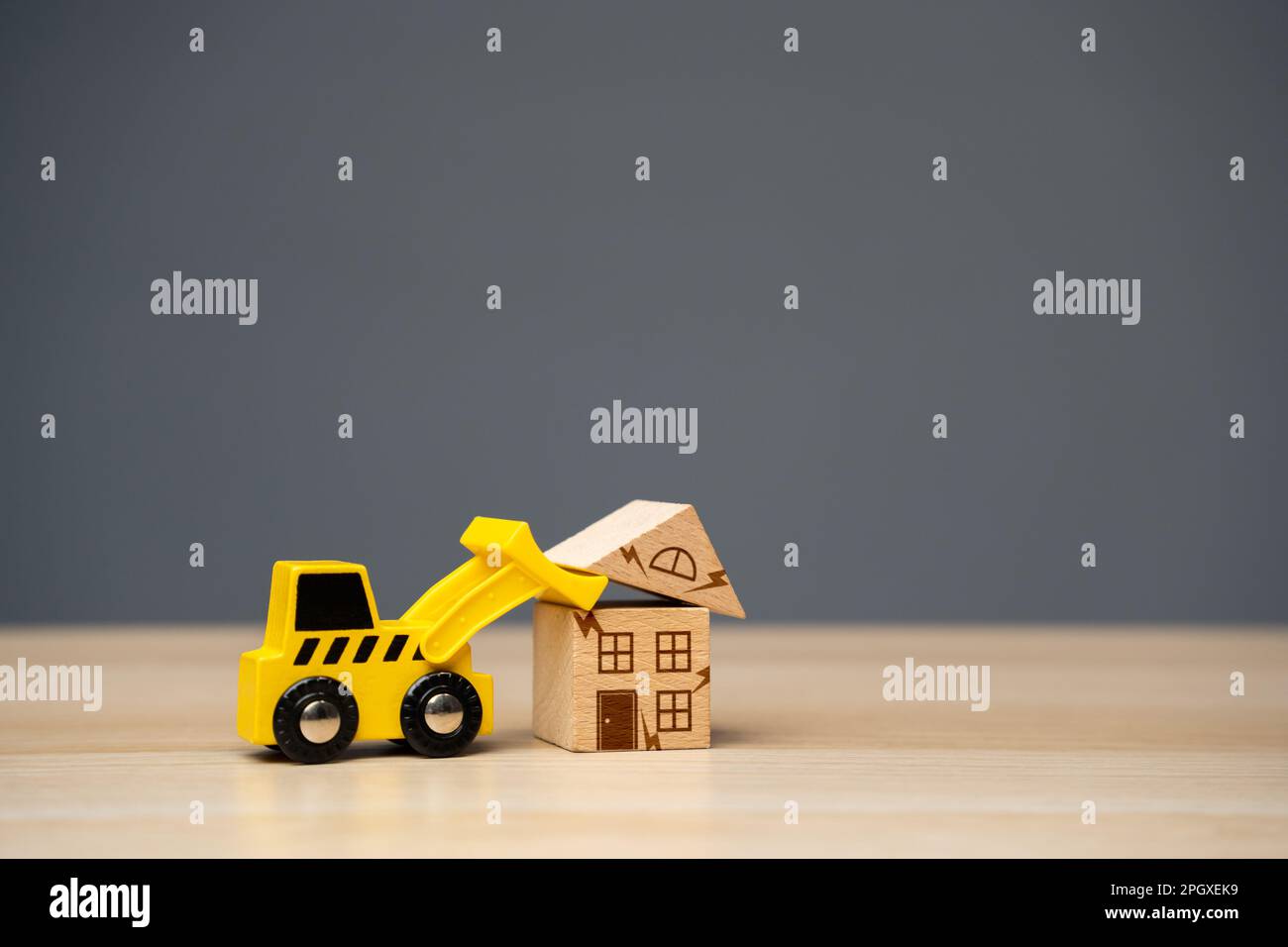 The bulldozer demolishes the house. Encroachment on private property ...