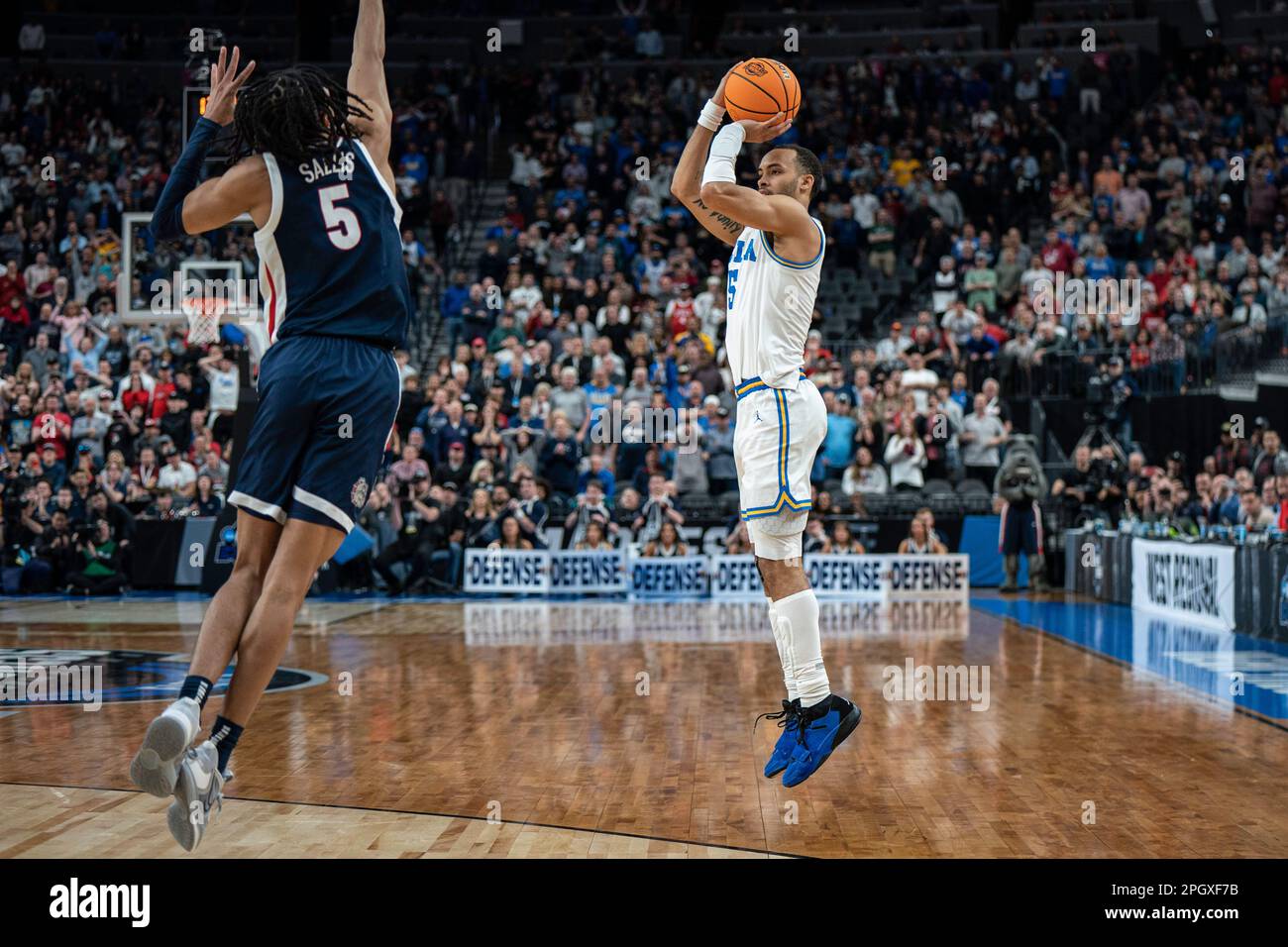 UCLA Bruins guard Amari Bailey (5) scores a three pointer over Gonzaga Bulldogs guard Hunter ...