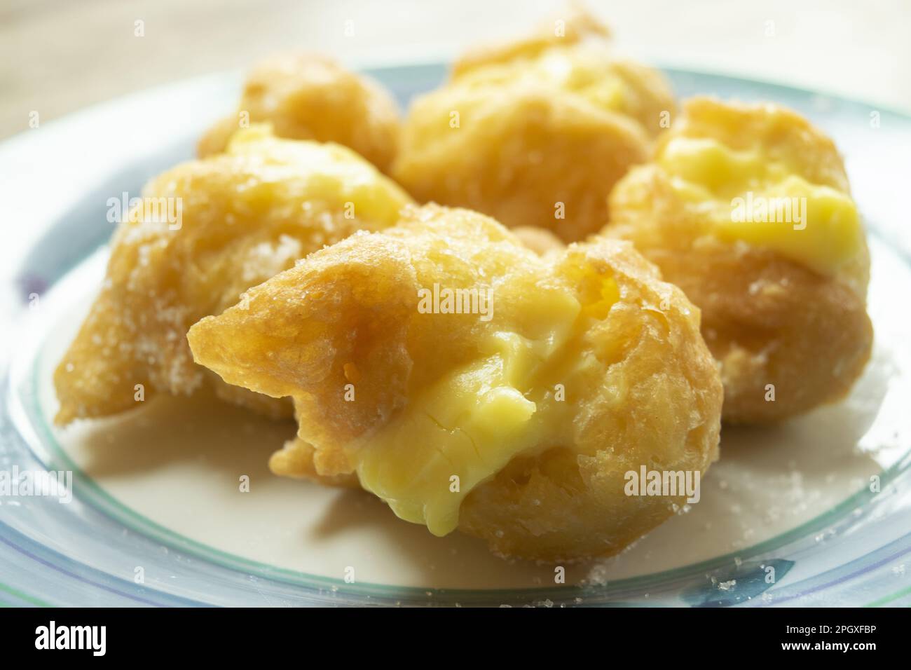 traditional fried cream puff filled with Chantilly cream Stock Photo ...