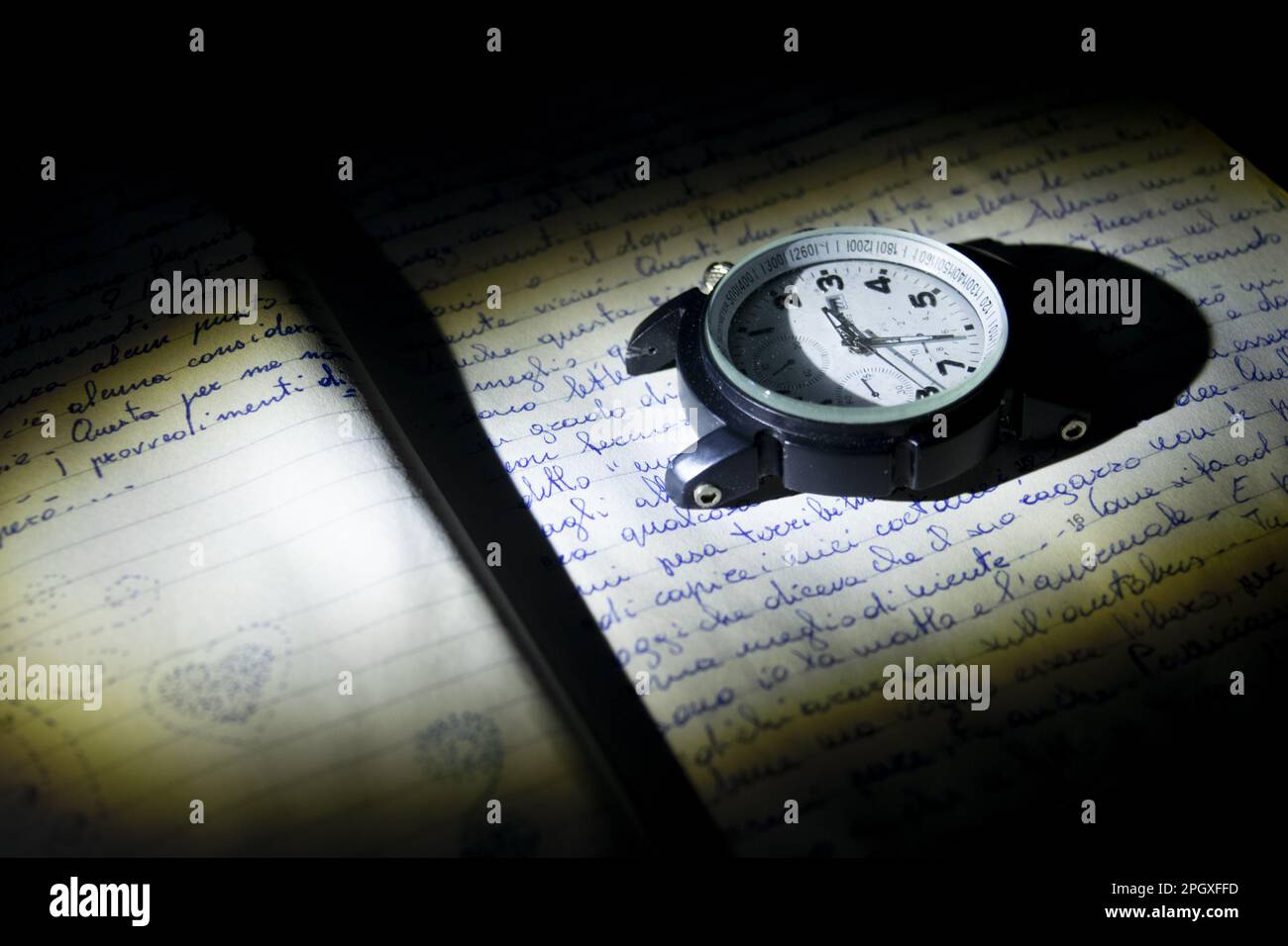 old clock in a handwritten notebook Stock Photo - Alamy