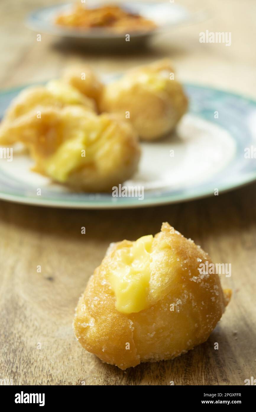 traditional fried cream puff filled with Chantilly cream Stock Photo ...