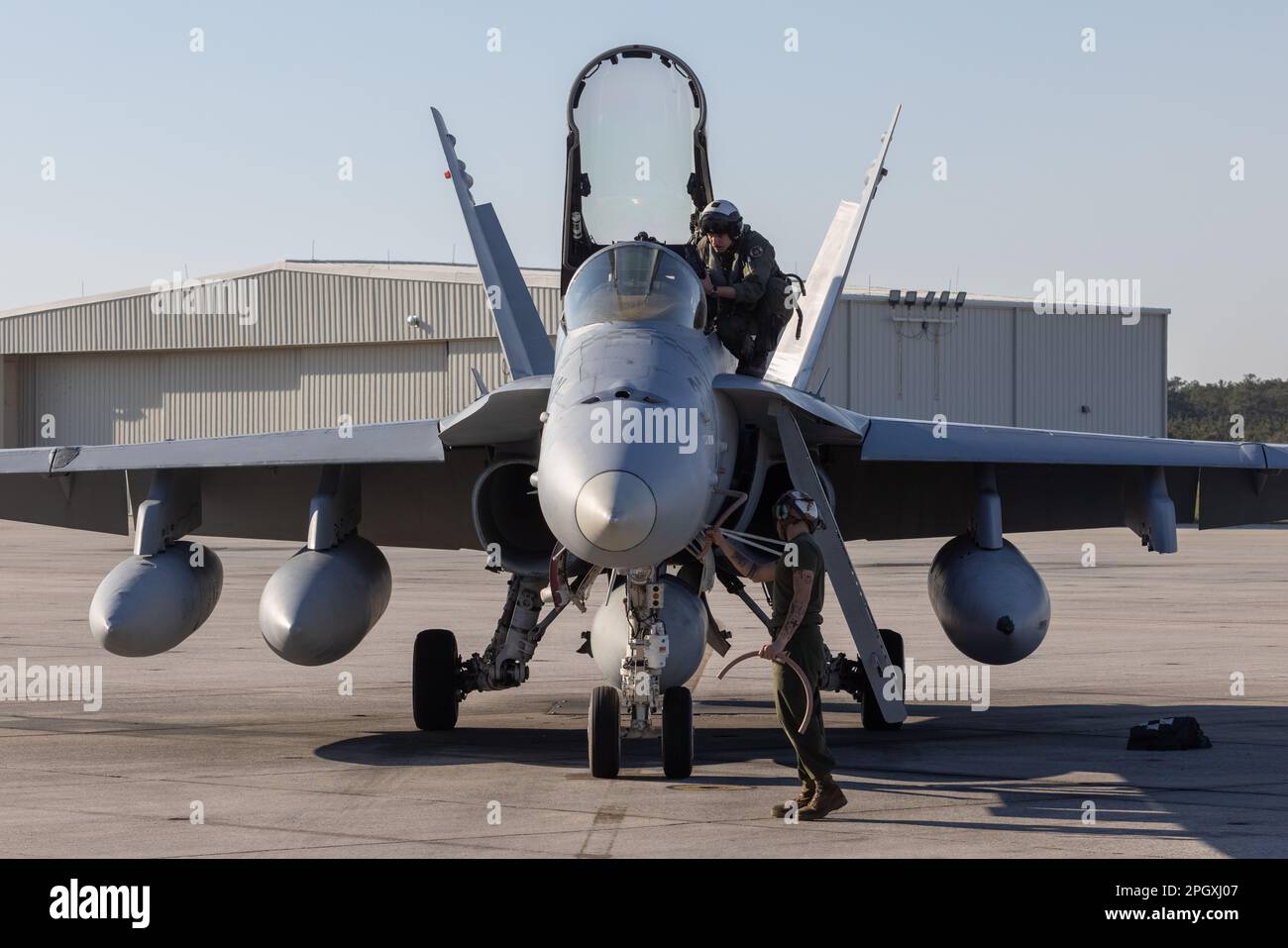 U.S. Marines with Marine Fighter Attack Squadron (VMFA) 312, return ...