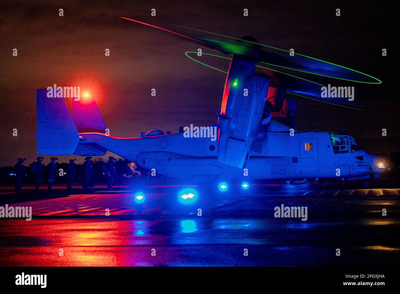 U.S. Marines with the 26th Marine Expeditionary Unit (MEU), board a MV ...