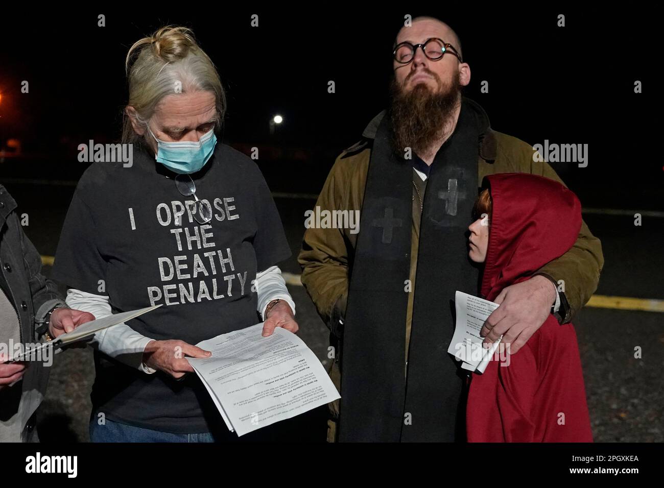 FILE - Death penalty opponents Sheila O'Flaherty, left, Rev. Jeff Hood ...
