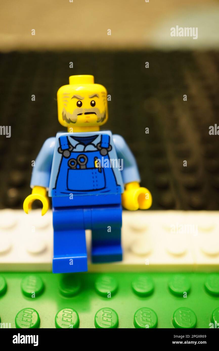 An unhappy Lego construction worker with beard Stock Photo - Alamy